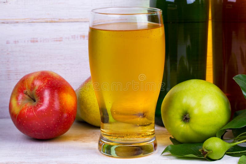 Glass and bottles of cider stock image. Image of bottles - 55520697