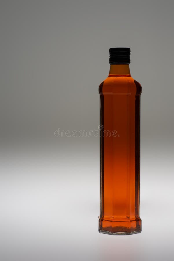 Glass Bottles Filled with Food Colouring on a White Background Stock ...