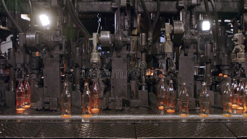 Glass Bottles Production. Glass Bottles on a Conveyor Belt in an ...