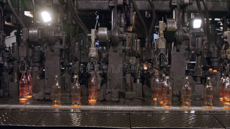 Glass Bottles Production. Glass Bottles on a Conveyor Belt in an ...