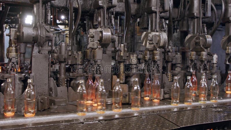 Glass Bottles Production. Glass Bottles on a Conveyor Belt in an ...