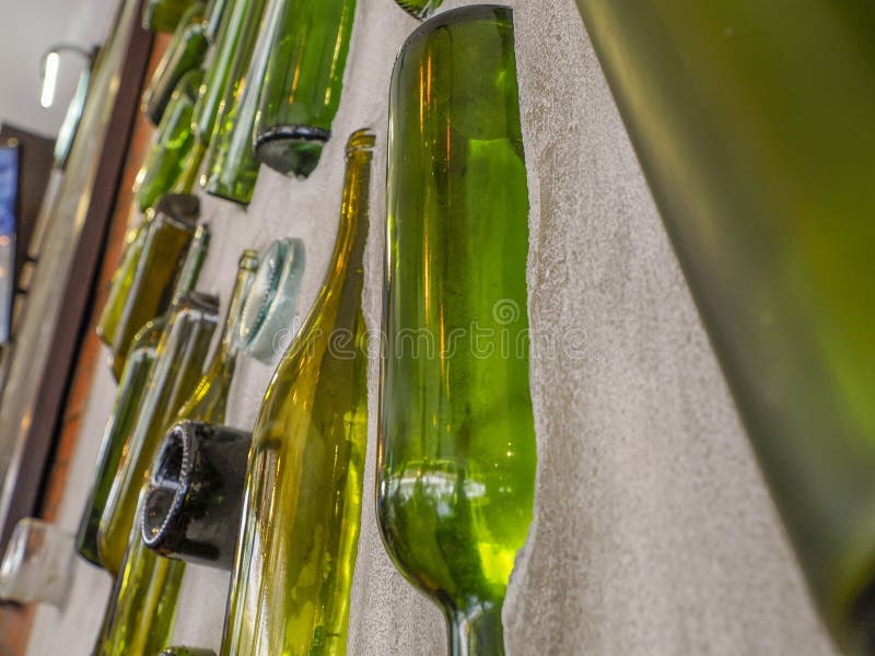 Glass Bottles in a Wall Detail Editorial Stock Photo - Image of ...