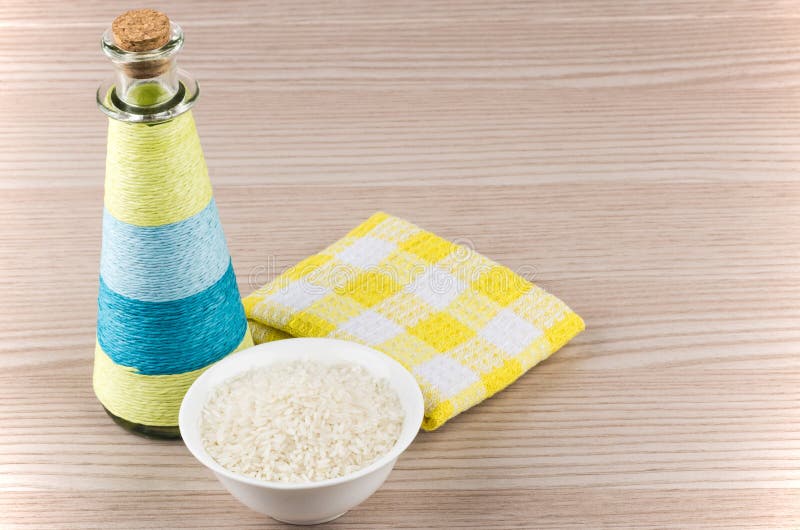 Glass Bowl with Rice, Bottle of Oil and Napkin Stock Image - Image of ...