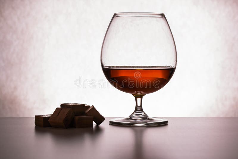 Glass of Brandy and Chocolate Pieces Stock Photo - Image of chocolate ...