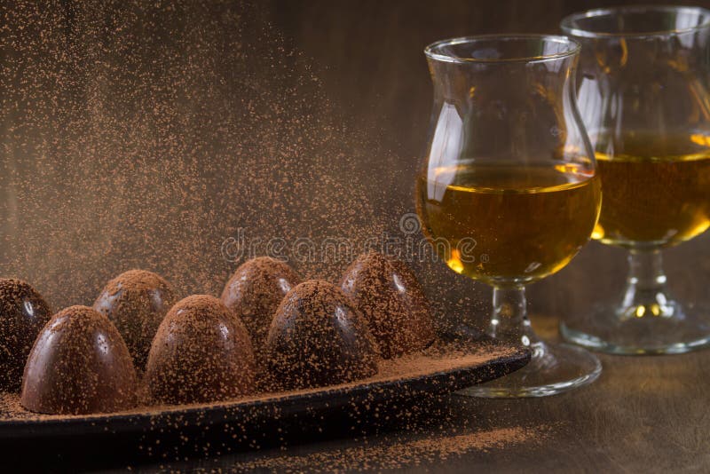 Glass of Brandy with Chocolate Stock Image - Image of alcohol, table ...