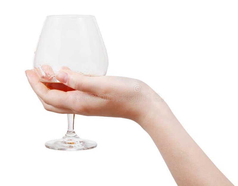 Glass with Brandy in Hand Isolated Stock Photo - Image of wineglass ...