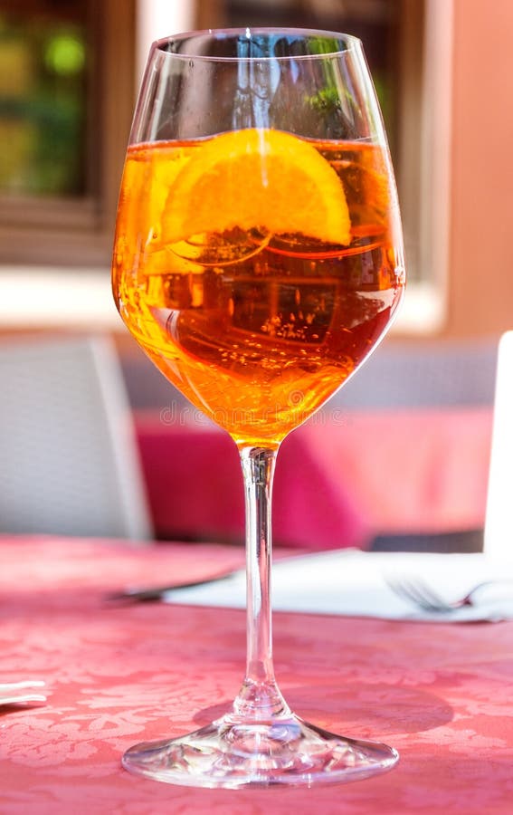 A Glass with Bright Orange Liquid, Spritz Aperol Cocktail Stock Image ...