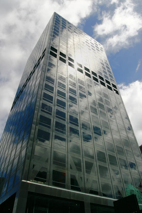 Glass Building with Clouds stock image. Image of mirrored - 5008185