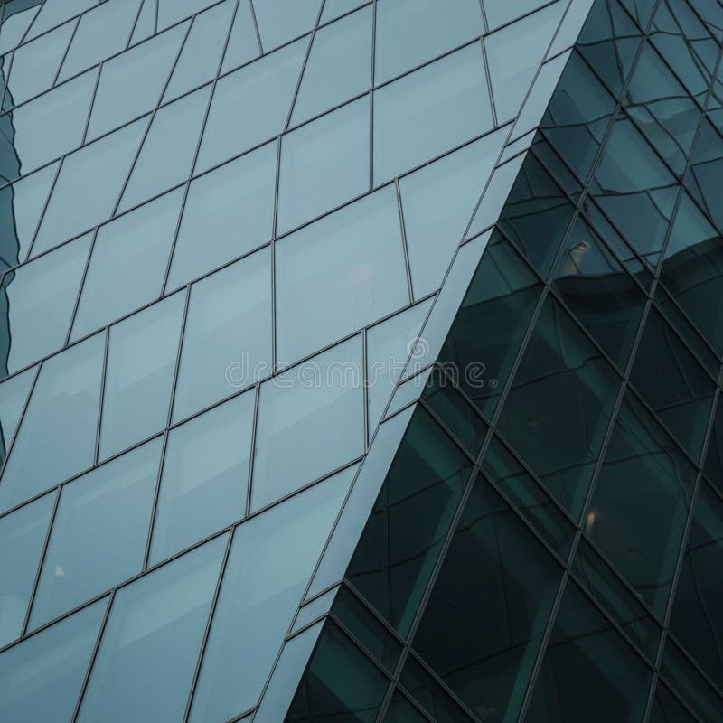 Glass Building Façade with Intersecting Diagonal Grid Patterns ...