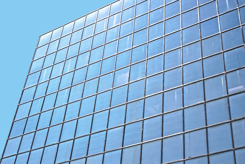 Glass Building Full of Windows Against Blue Sky- Photographed from an ...