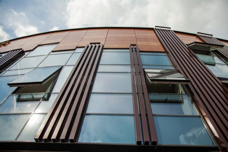 Glass Building with Open Windows, a Reflection of the Sky Stock Photo ...