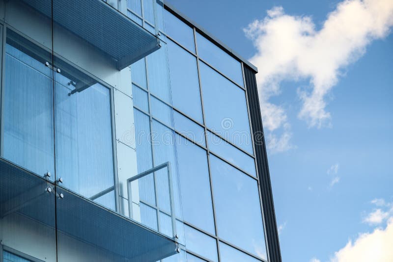 Glass Building with Sky and Clouds Reflection in Windows Stock Image ...