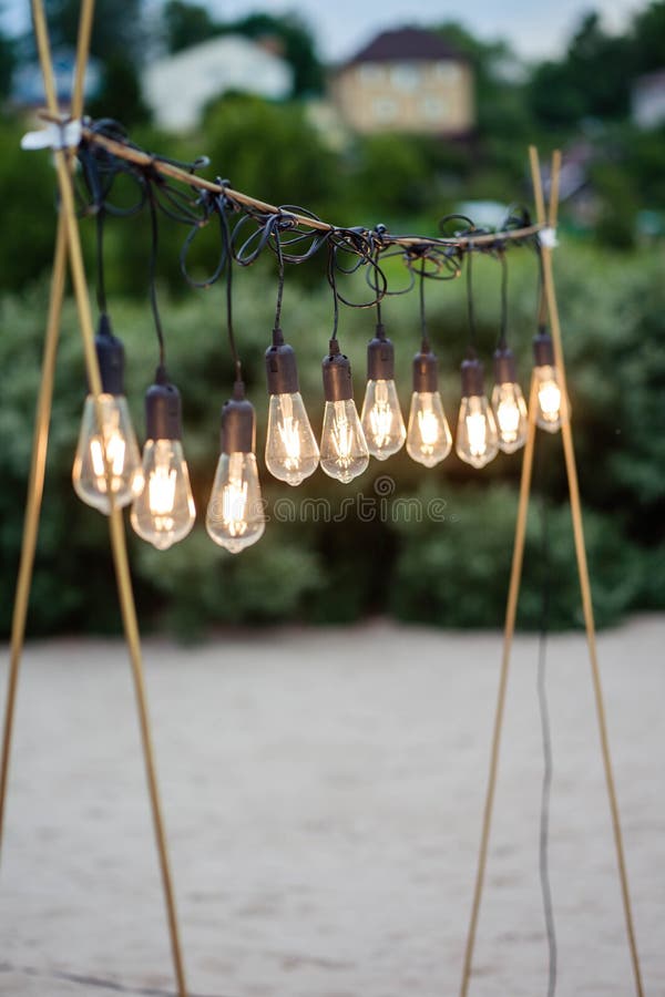 Glass Bulbs Hang on a Stand and Glow Stock Image - Image of fashion ...