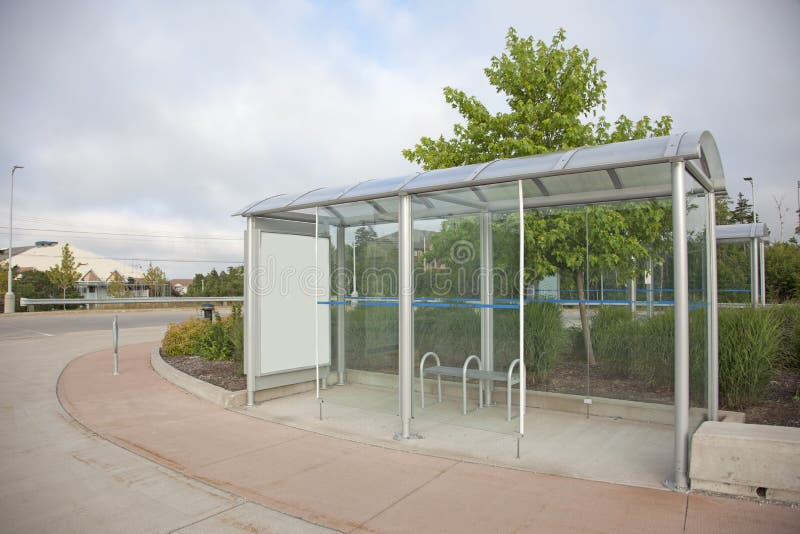 A glass bus stop stock photo. Image of outdoors, absence - 97313098