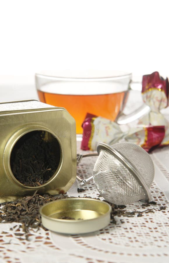 Glass Cap of Tea and Organic Black Tea in Metal Can Stock Photo - Image ...