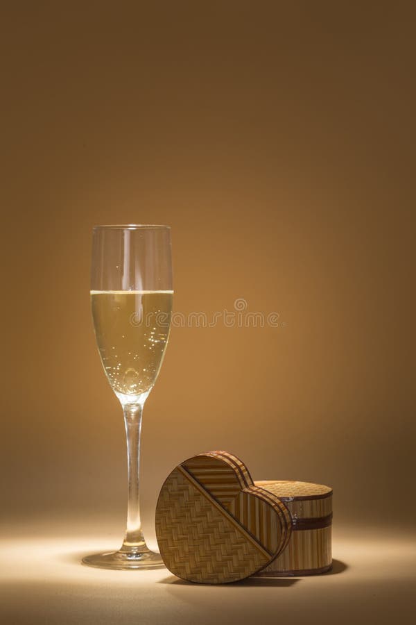 Glass of Cava and Heart-shaped Boxes in an Intimate Setting Stock Image ...