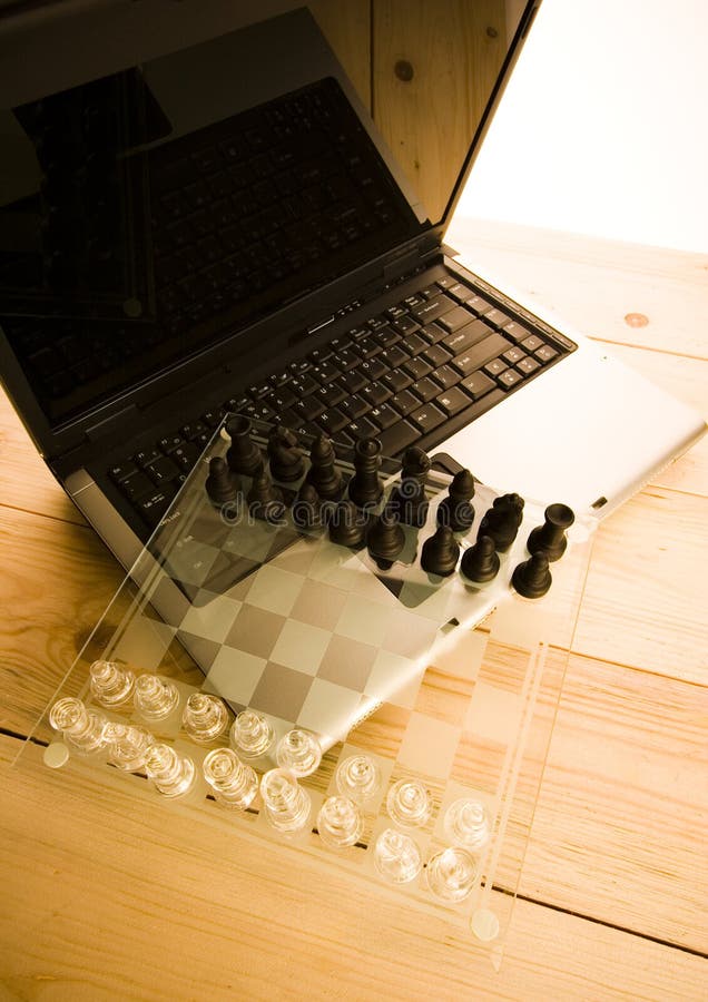 Glass chess & Laptop stock image. Image of challenge - 3236617