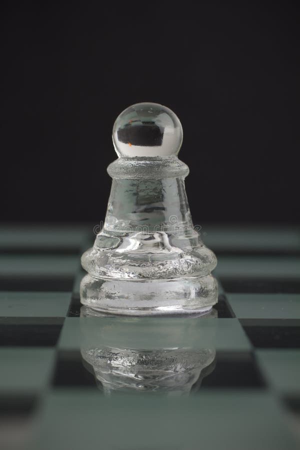 Glass Chess Pawn on the Cheesboard Stock Photo - Image of check, pawn ...