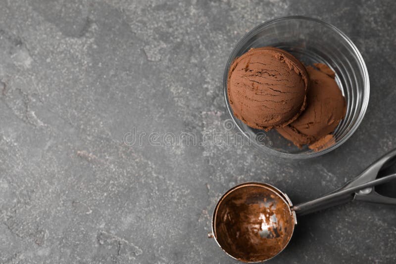 Glass of Chocolate Ice Cream and Scoop on Grey Table, Flat Lay Stock ...
