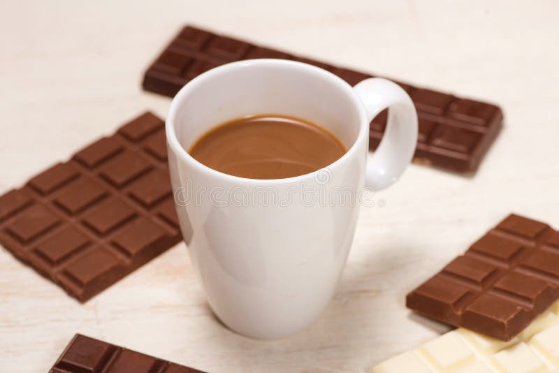 Glass of Chocolate Milk and Bars Chocolates on Table Stock Image ...