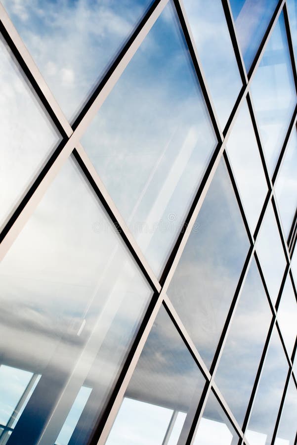 Glass Cladding Panels and Windows of Modern Buildings. Geometry and ...
