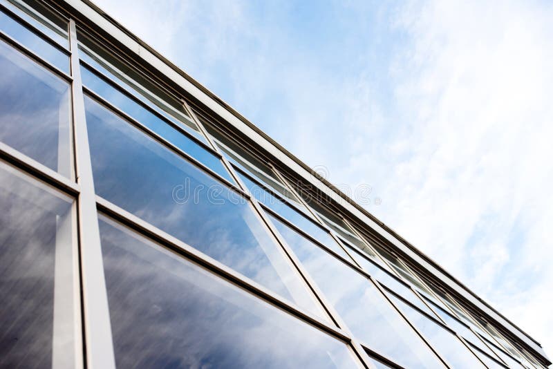 Glass Cladding Panels and Windows of Modern Buildings. Geometry and ...