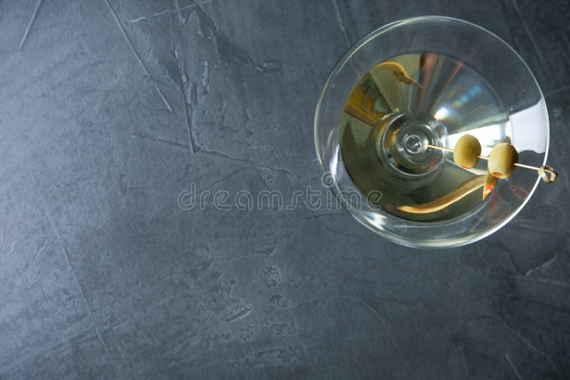 Glass of Classic Dry Martini with on Dark Grey Table, Top View. Space ...