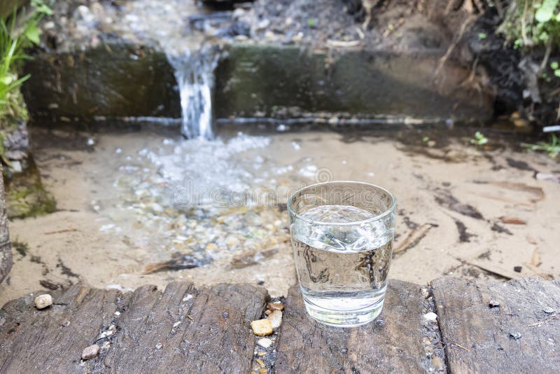 A Glass of Clean Spring Water Outdoor. Source of Clean Natural Water ...