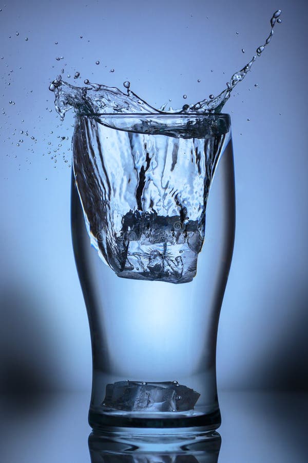 A Glass of Clean Water into Which an Ice Cube Was Thrown, Water ...