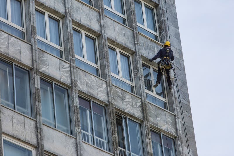Glass Cleaner Working on a Building Editorial Image - Image of steam ...
