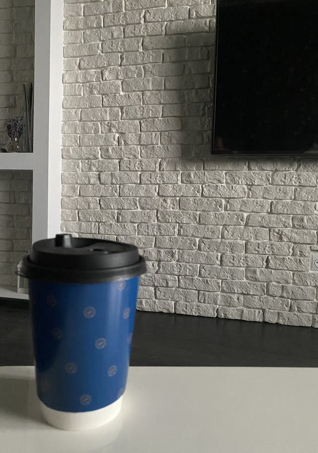 A Glass of Coffee is on the Table in the House. Side View, Interior of ...