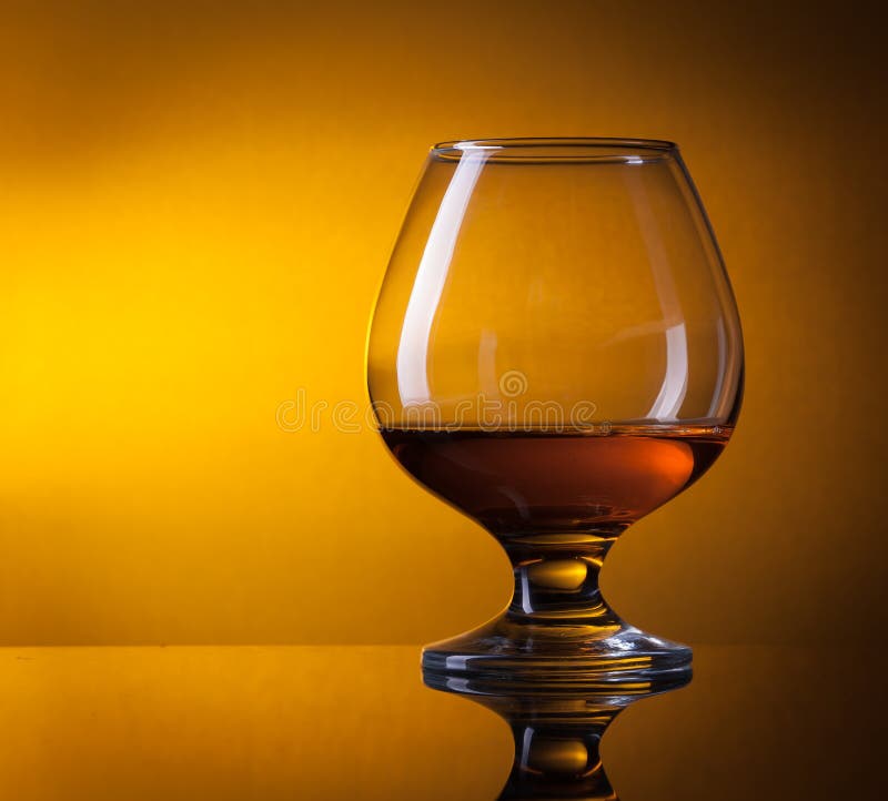 Glass with cognac stock photo. Image of liquid, macro - 32370888