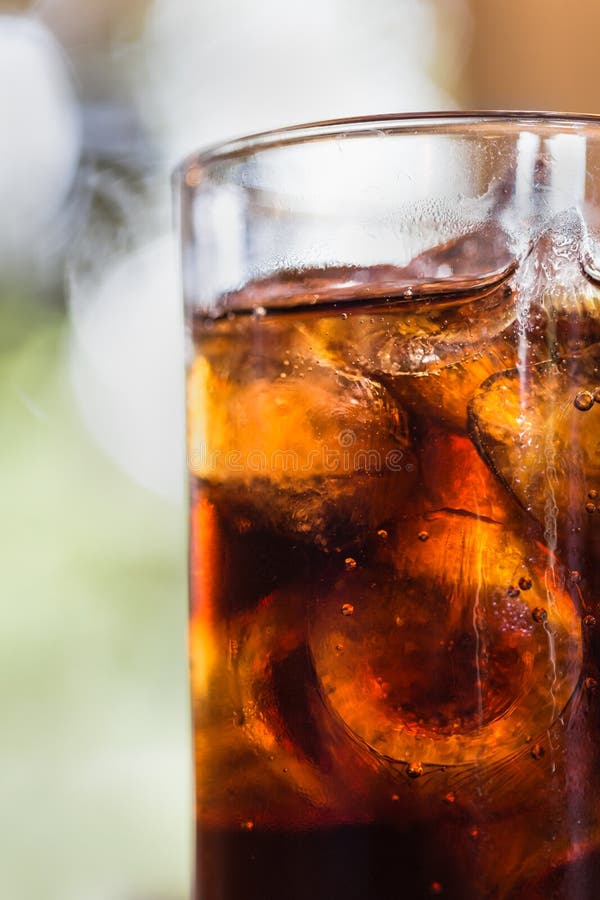 A glass of coke stock photo. Image of light, cocacola - 33536016