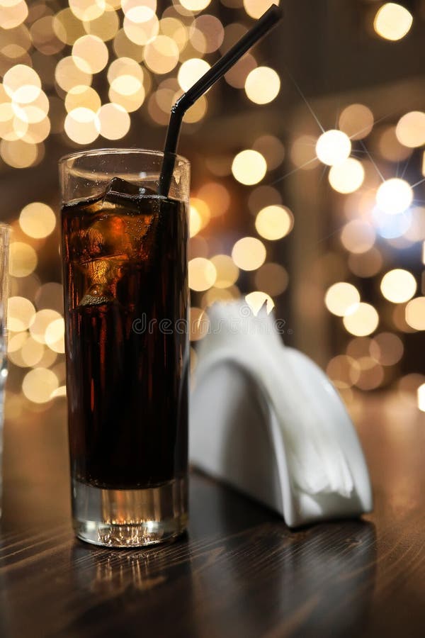 Glass of Cold Alcohol Drink with Ice on Table Stock Photo - Image of ...