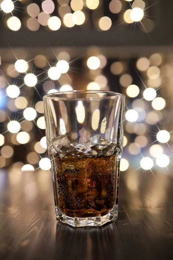 Glass of Cold Alcohol Drink with Ice on Table Stock Image - Image of ...