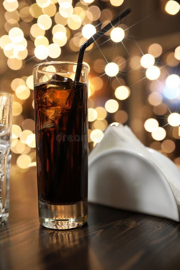 Glass of Cold Alcohol Drink with Ice on Table Stock Photo - Image of ...