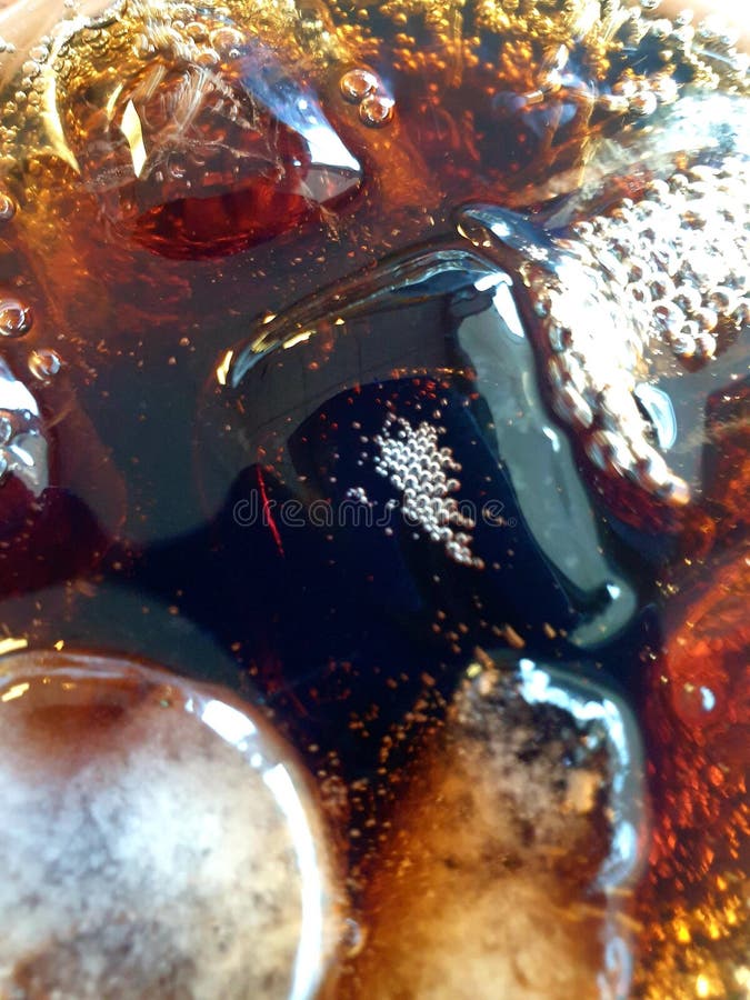 Trapped Bubbles Inside a Frozen Ice Cube Stock Photo - Image of frozen ...