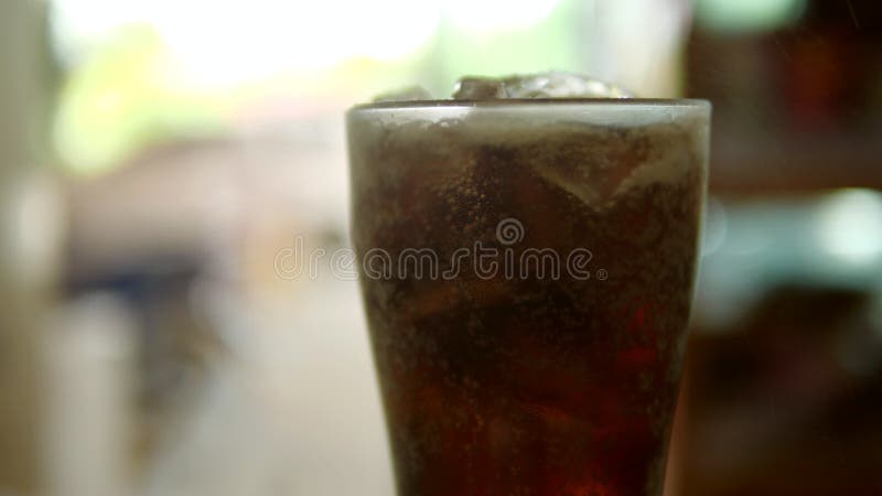 Cold Cola is Poured into a Glass Glass with Ice Stock Footage - Video ...
