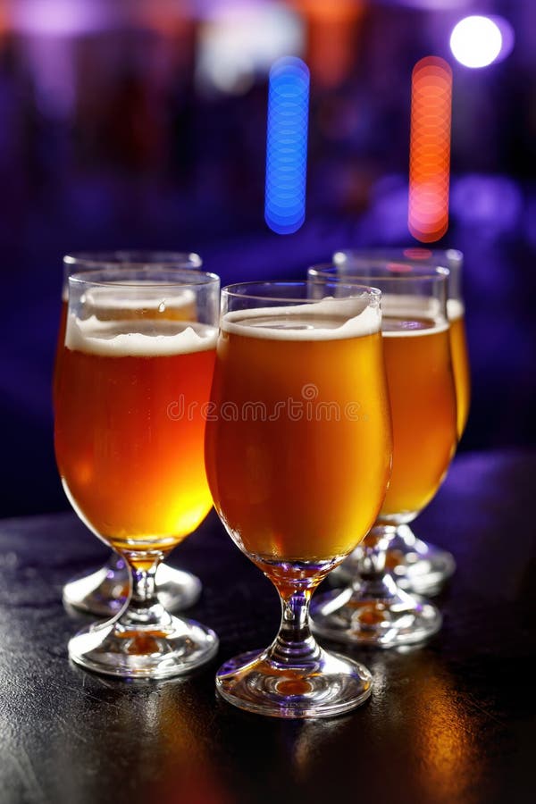 A Glass of Cold Draft Beer in a Pub. Stock Image - Image of table ...