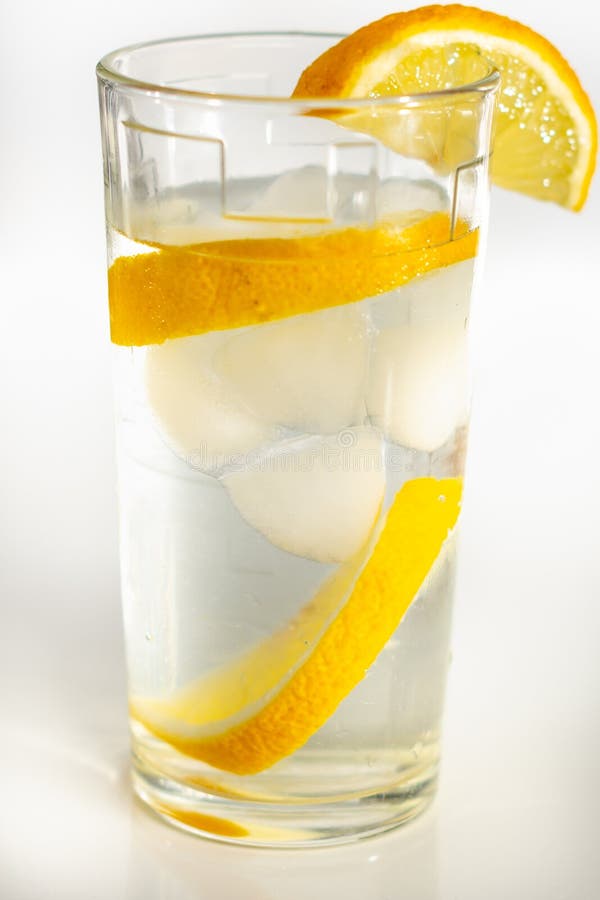 Glass of Cold Fresh Water with Slices of Ice and Lemon Stock Image ...