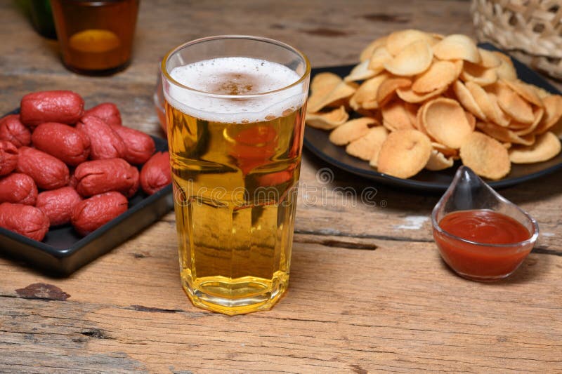 Glass of Cold Light Beer with Snacks Stock Image - Image of closeup ...