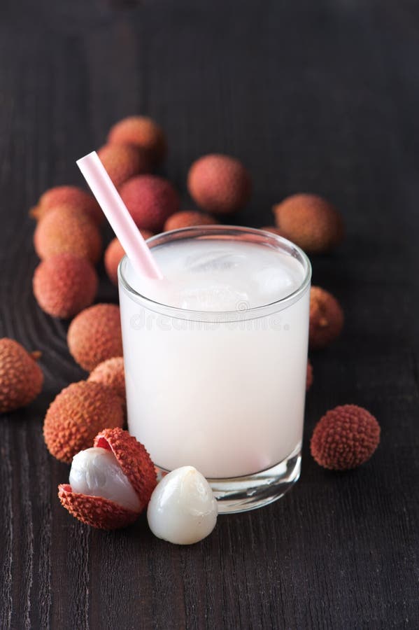Glass of Cold Lychee Juice on the Wooden Table Stock Photo - Image of ...