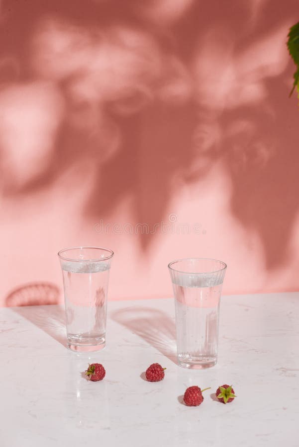 Glass of Cold Raspberry Cider with Fresh Berries on Light Background ...