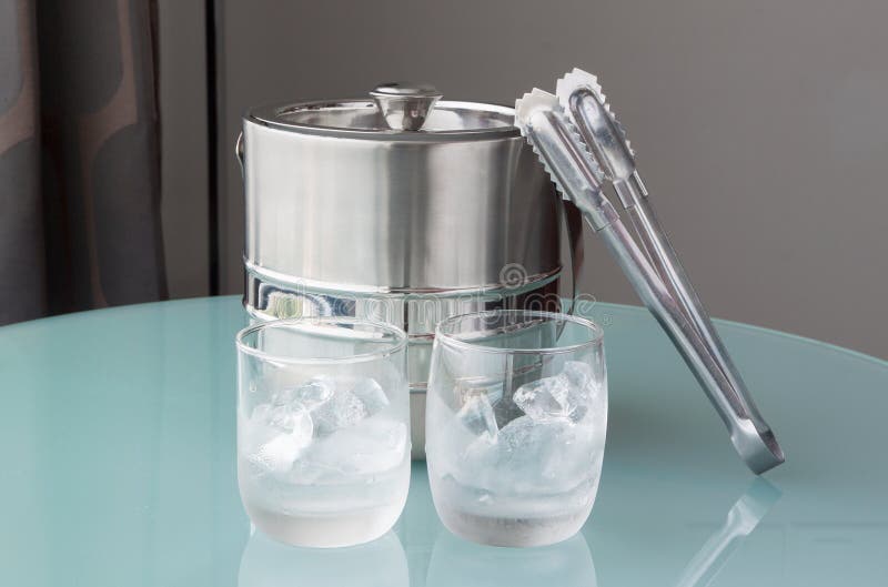 Glass of Cold Water and Ice with Stainless Bucket Stock Image - Image ... Glass of Cold Water and Ice with Stainless Bucket Stock Image - Image ...