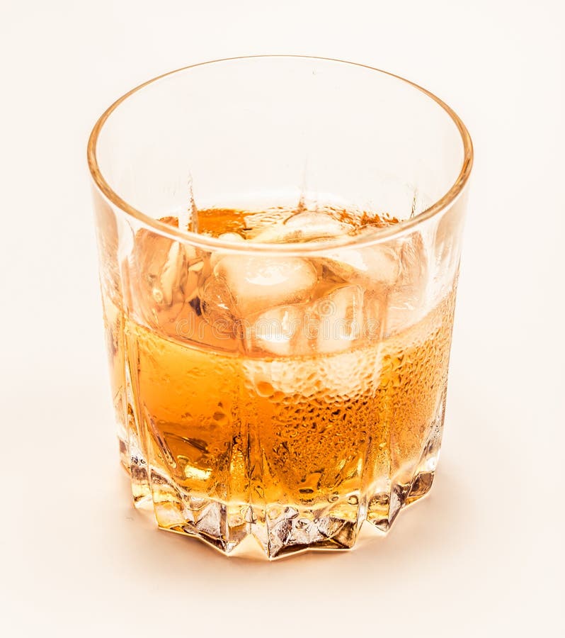 Glass of Cold Whiskey on White Stock Photo - Image of beverage, golden ...