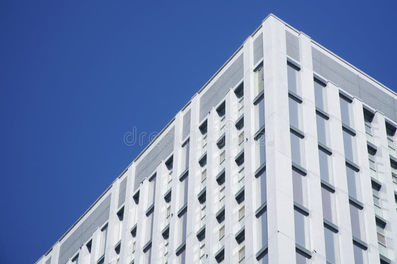 Glass and Concrete on the Corner of the Top of the Facade of Modern ...