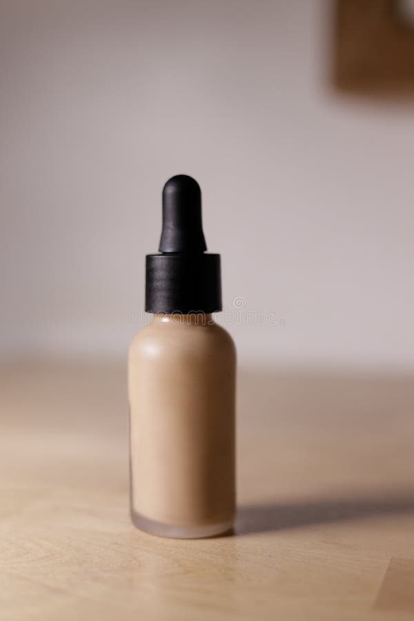 Container with Make-up Foundation and Dropper Applicator Stock Photo ...