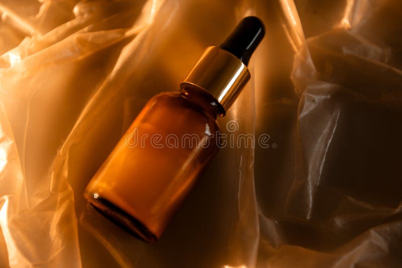 Glass Container in the Rays of the Setting Sun. Body Lotion. Skin Care ...