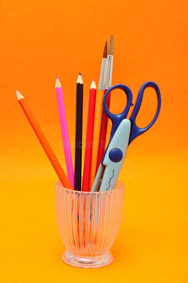 A Glass Container with Scissors and Pencils Stock Image - Image of ...