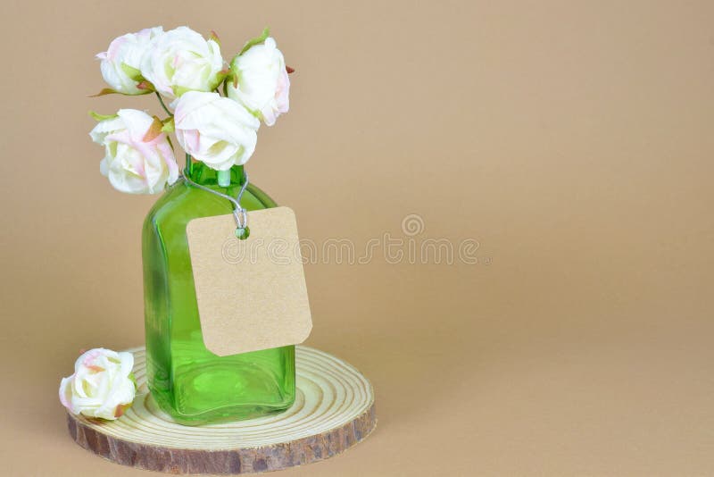 Glass Container with a Small Bouquet of Fabric Roses Stock Photo ...